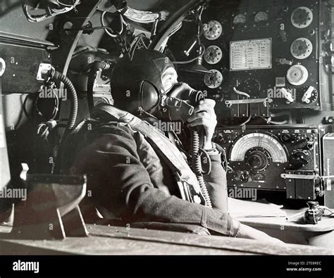 N Raf Radio Operator On A Lancaster Bomber About 1943 In Front Of Him