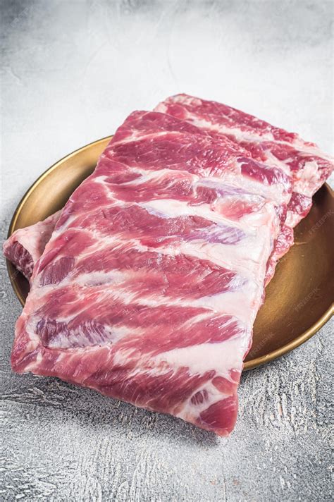 Premium Photo Rack Of Raw Pork Spare Ribs White Background Top View