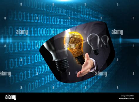 Light Bulb Graphic On Abstract Screen Against Shiny Blue Binary Code On