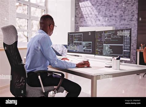 African American Man Programmer Girl Coding On Computer Stock Photo Alamy