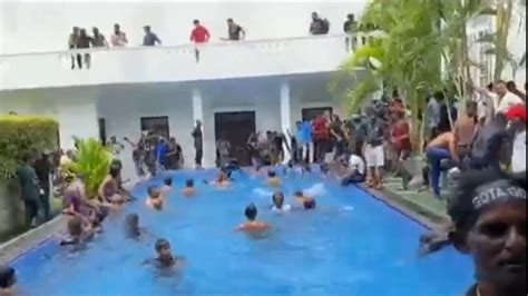 ‘total Mayhem As Thousands Of Protesters Storm Private Palace Of Sri