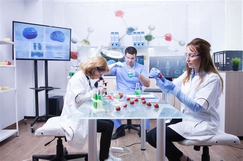 Premium Photo Female Doctor Examining Chemical In Laboratory