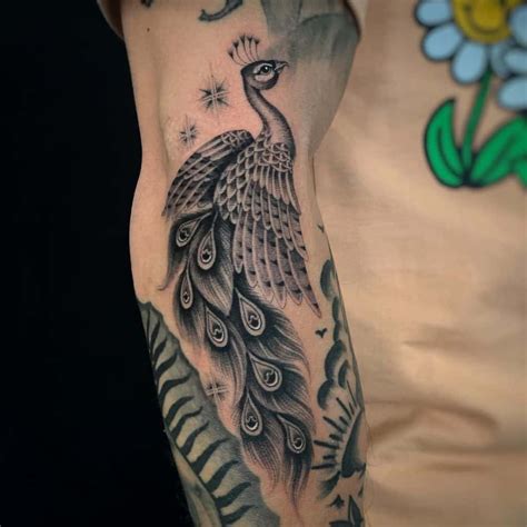Peacock Tattoo Meaning Symbolism And Peacock Tattoo Ideas