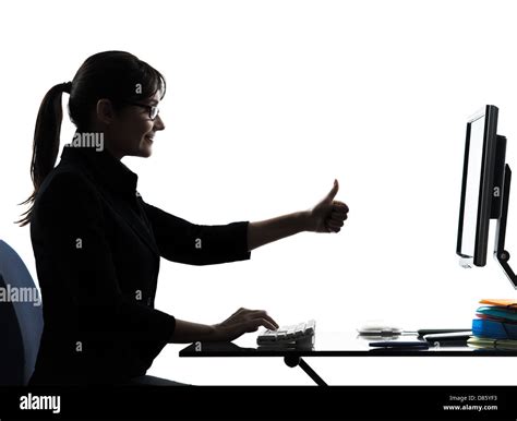 one business woman computer computing thumb up satisfied silhouette