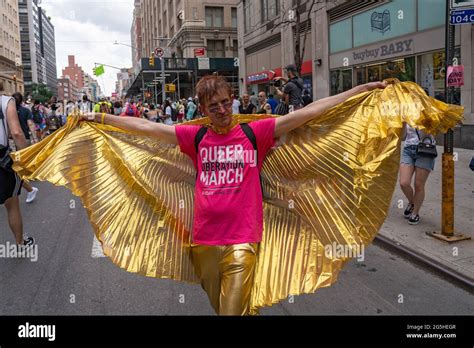 A Marcher Display His Golden Wings During The Queer Liberation March In