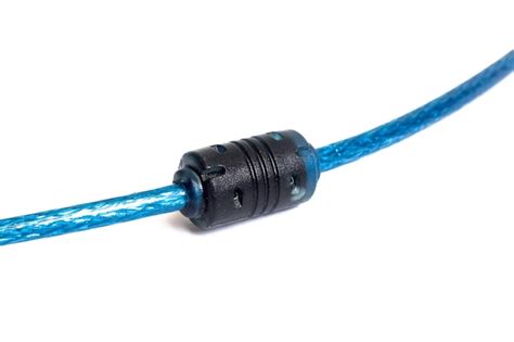 Premium Photo Interference Filter On A Blue Wire Isolated On White Background