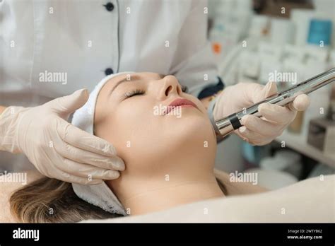 Rejuvenating Facial Therapy Treatment At Spa Salon Clinic Young