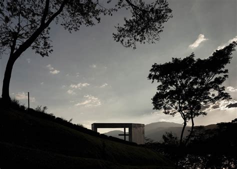 Skewed Concrete Chapel Balances Over Mountainside