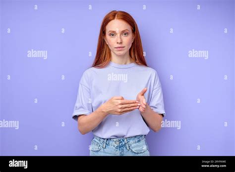 Young Red Haired Good Looking Girl Working As A Sign Language