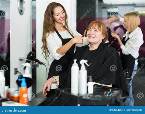 Barber Makes The Cut For Woman Stock Image Image Of Hairdresser Combs 62864351