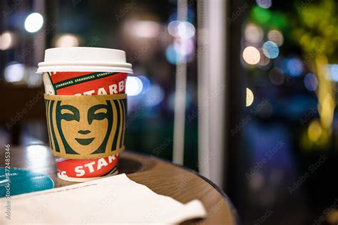 Starbucks Hot Coffee Cup On The Table In The Starbucks Coffee Shop At