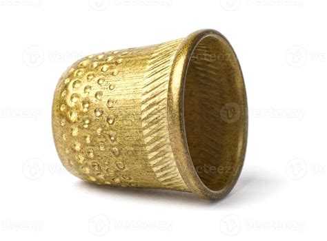 The Yellow Antique Thimble Is Isolated On A White Background