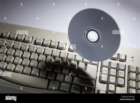 Computer Keyboard And DVD Disk Technology Concept Stock Photo Alamy