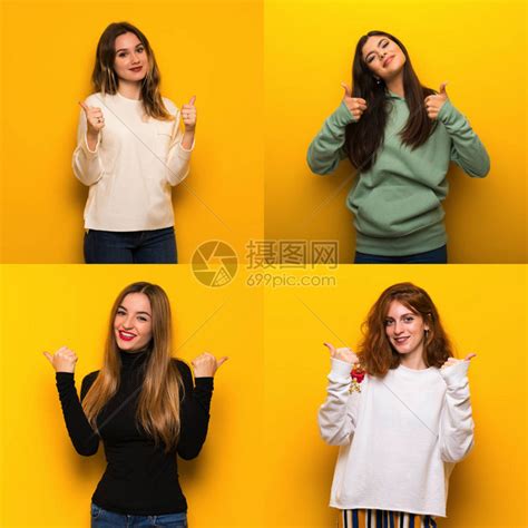 一群黄色背景的女人用双手和笑容举起拇高清图片下载 正版图片504613279 摄图网