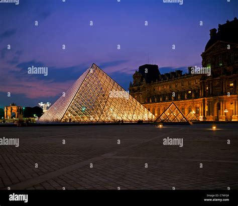 Louvre Museum Night View Of Pyramid Dusk Evening Twilight