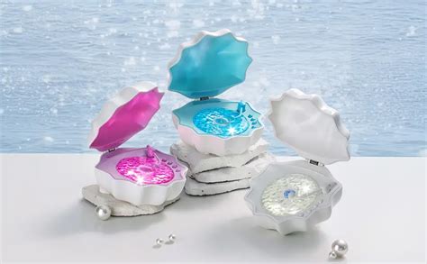 Amazon Com Shell Speaker With Northern Lights Projector Waves Vinyl Bluetooth Speaker With