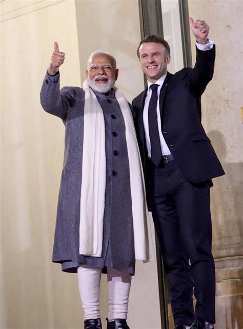 Pm Modi Greeted By ‘friend Macron In France