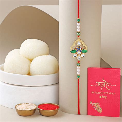 Designer Stone Rakhi With Rasgulla Delivery In Singapore Fnp Sg