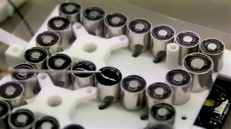 EA 2 Ground Test Setup With Two Ferrofluid Droplets Connecting FF