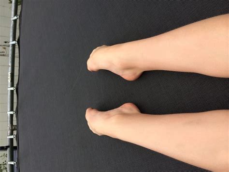 Elegant Gymnast Perfecting Her Form