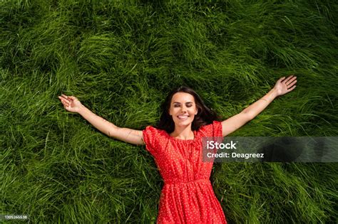 Photo Of Funny Cute Young Woman Dressed Red Offshoulders Dress Relaxing