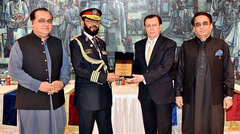 Secretary Senate Mohammad Qasim Samad Khan Presenting A Shield To Syed Javed Azhar Hasni