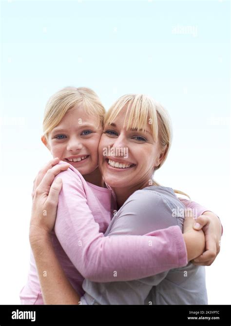 Theres Nothing Like A Mothers Love A Happy Young Girl Giving Her