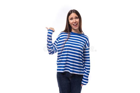 Pretty Slender Brunette With Straight Hair Is Dressed In A Blue Striped