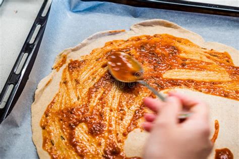 Fresh Original Italian Raw Pizza Dough Preparation With Tomato Sauce