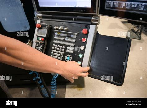 Cnc Monitor When Displaying The Program The Worker Points With His Hand Stock Photo Alamy