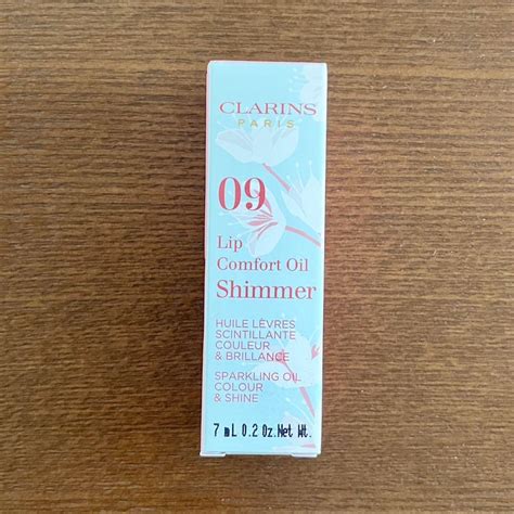 【新品未使用】clarins（クラランス）コンフォートリップオイルシマー（09） メルカリ