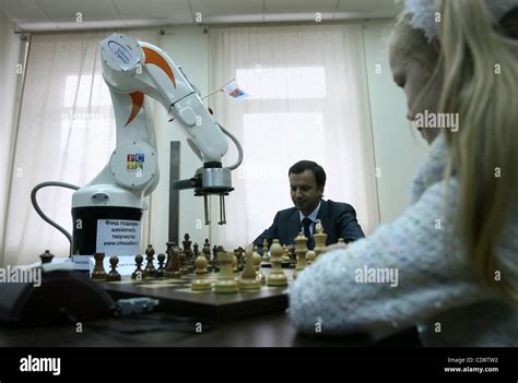 chess match with a chess playing robot pictured chess player arina