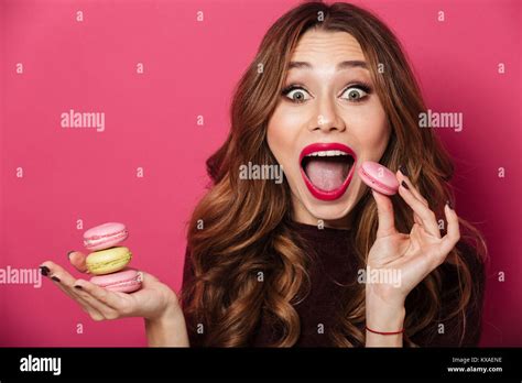 Photo Of Young Surprised Lady Standing Isolated Over Pink Background