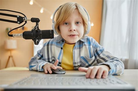 Premium Photo Cute Schoolboy Clicking Mouse And Pressing Buttons Of