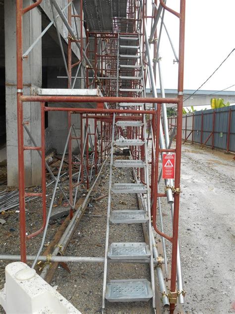 Temporary Access And Metal Staircase Made From Staging And Scaffolding The Construction Site