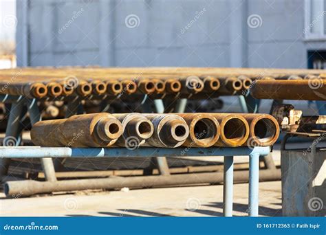 Rust Pipe And Drill Bits Used In The Oil Industry Stock Image Image