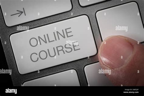 A Man Pressing A Key On A Computer Keyboard With The Words Online Course Online Learning