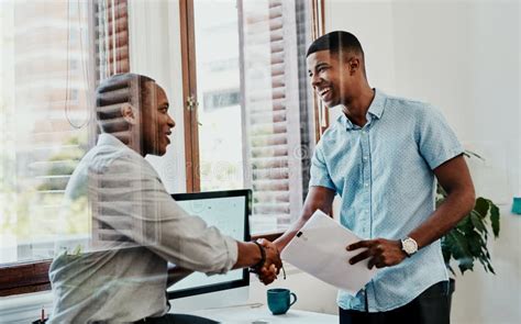 Pleasure Doing Business With You Two Young Businessmen Shaking Hands