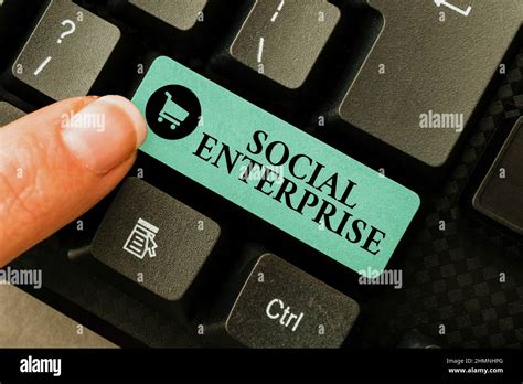 Hand Writing Sign Social Enterprise Word Written On Business That Makes Money In A Socially