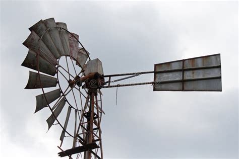 Tall Metal Structure Windmill Against Blue Sky Stock Image Image Of