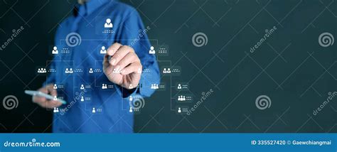 Hierarchy Structure Concept Businessman With A Stylus Tapping At Organization Chart As A
