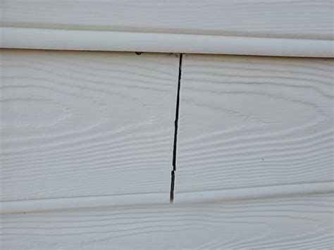 Growing Gaps On House Siding Many Are Lifting Away From The Home