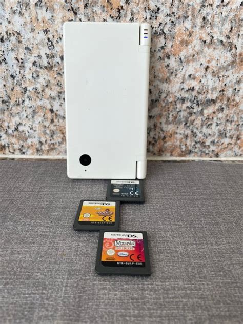 1 Nintendo Dsi Console With Games 3 Catawiki
