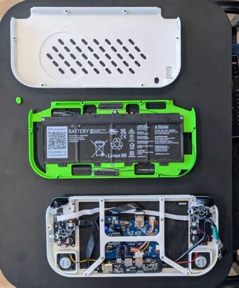 build your own handheld gaming pc with a framework mainboard and this