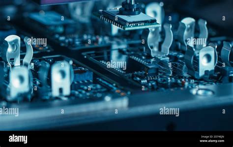 Close Up Macro Shot Of Electronic Printed Circuit Board Being Assembled