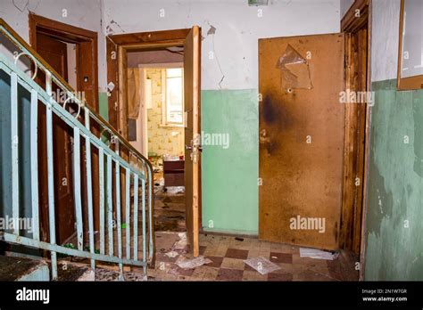 Entrance In An Abandoned Apartment Building After The Resettlement Of