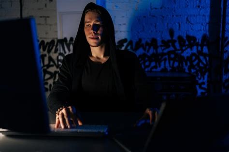 Premium Photo Portrait Of Hidden Hacker Man Wearing Sweatshirt With