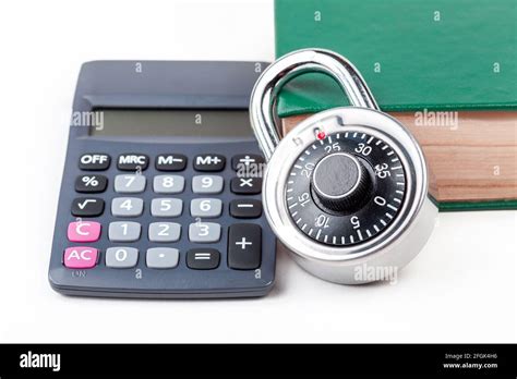 Simple Calculator Coded Padlock And A Closed Book Math Textbook On