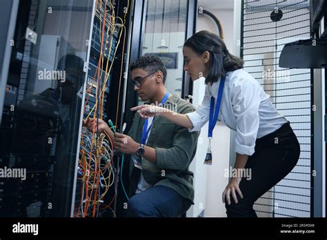 It People Engineer Or Server Room Cable For Programming Or Connection Maintenance Man And