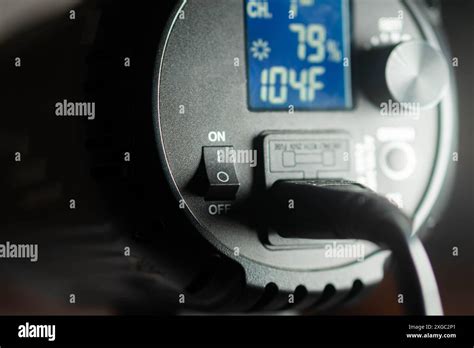 Close Up Of An Electronic Device With A Digital Display Showing Temperature And Humidity The